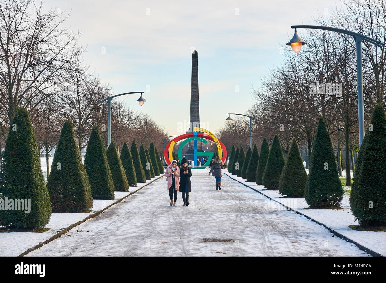 Glasgow Green park in winter with the Nelson monument and a ...