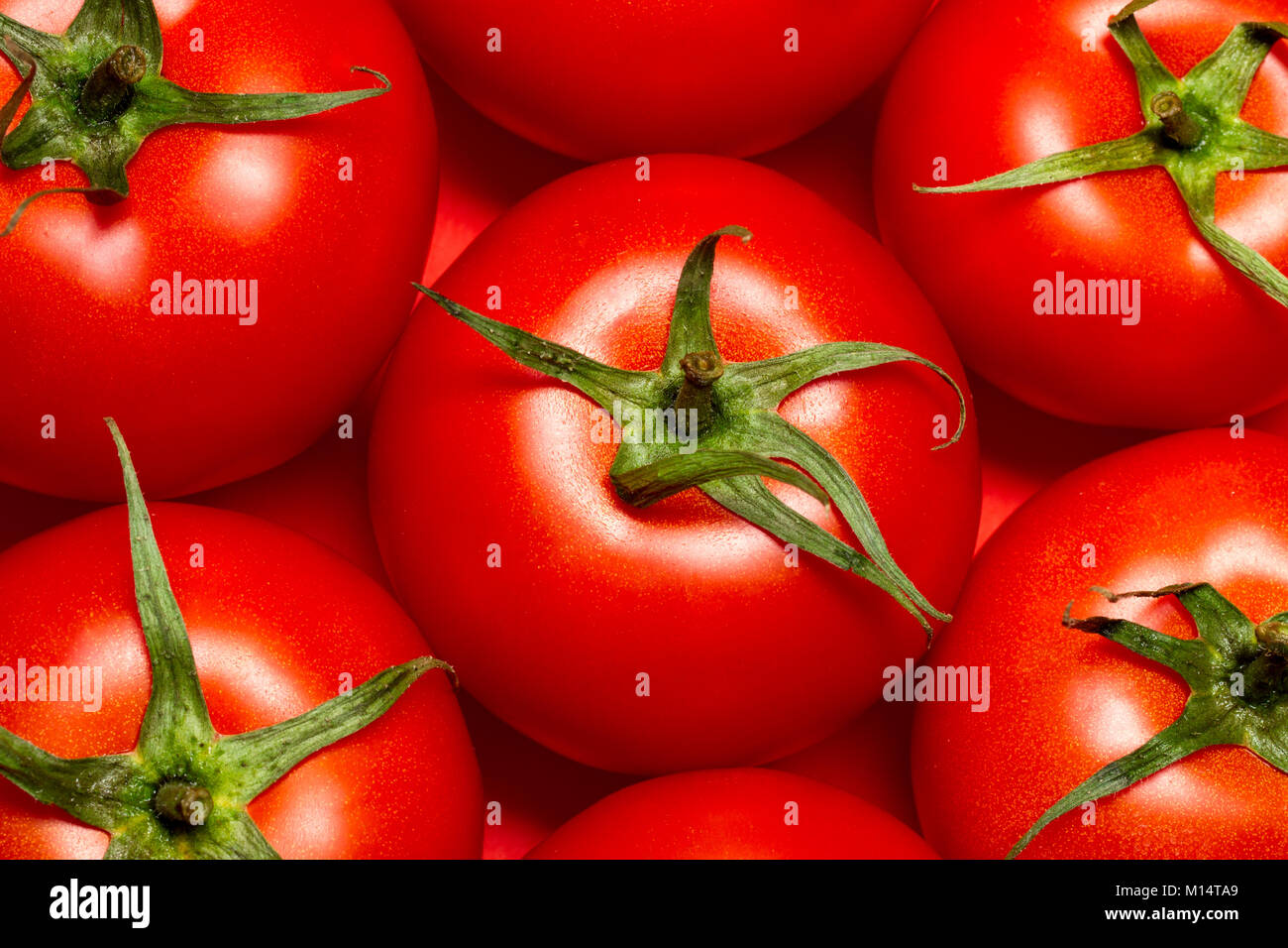 A Few Tomatoes Lie Stock Photo - Alamy