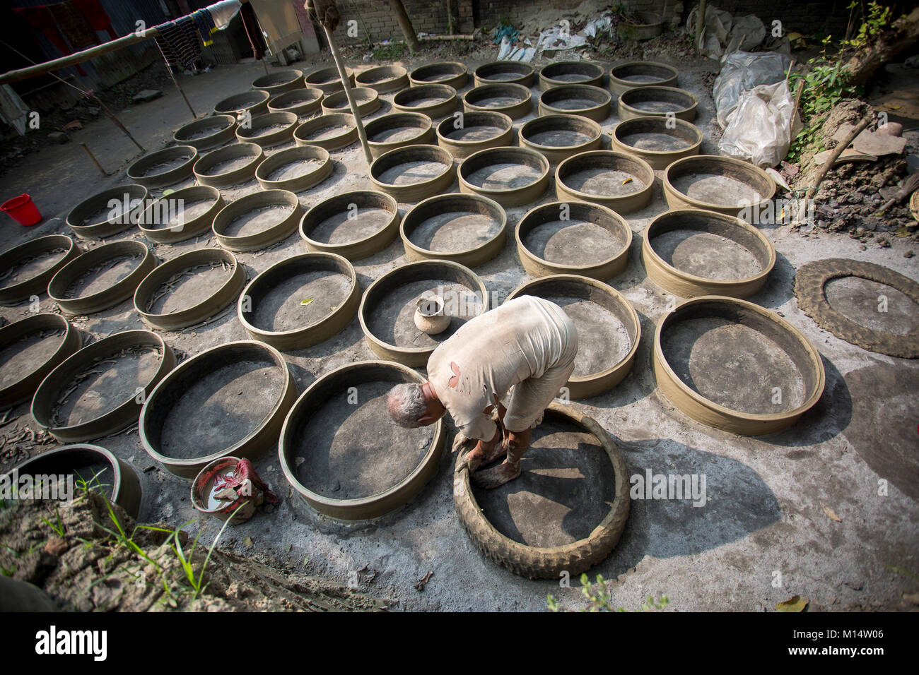 A potter Guru Poddo Pal working on this profession 40 years almost ...