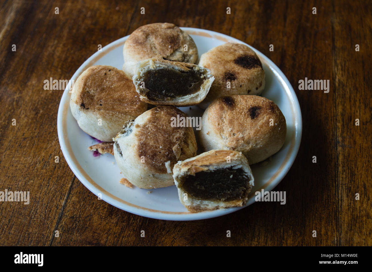 Typical Indonesian sweets: Bakpia centered on plate Stock Photo - Alamy