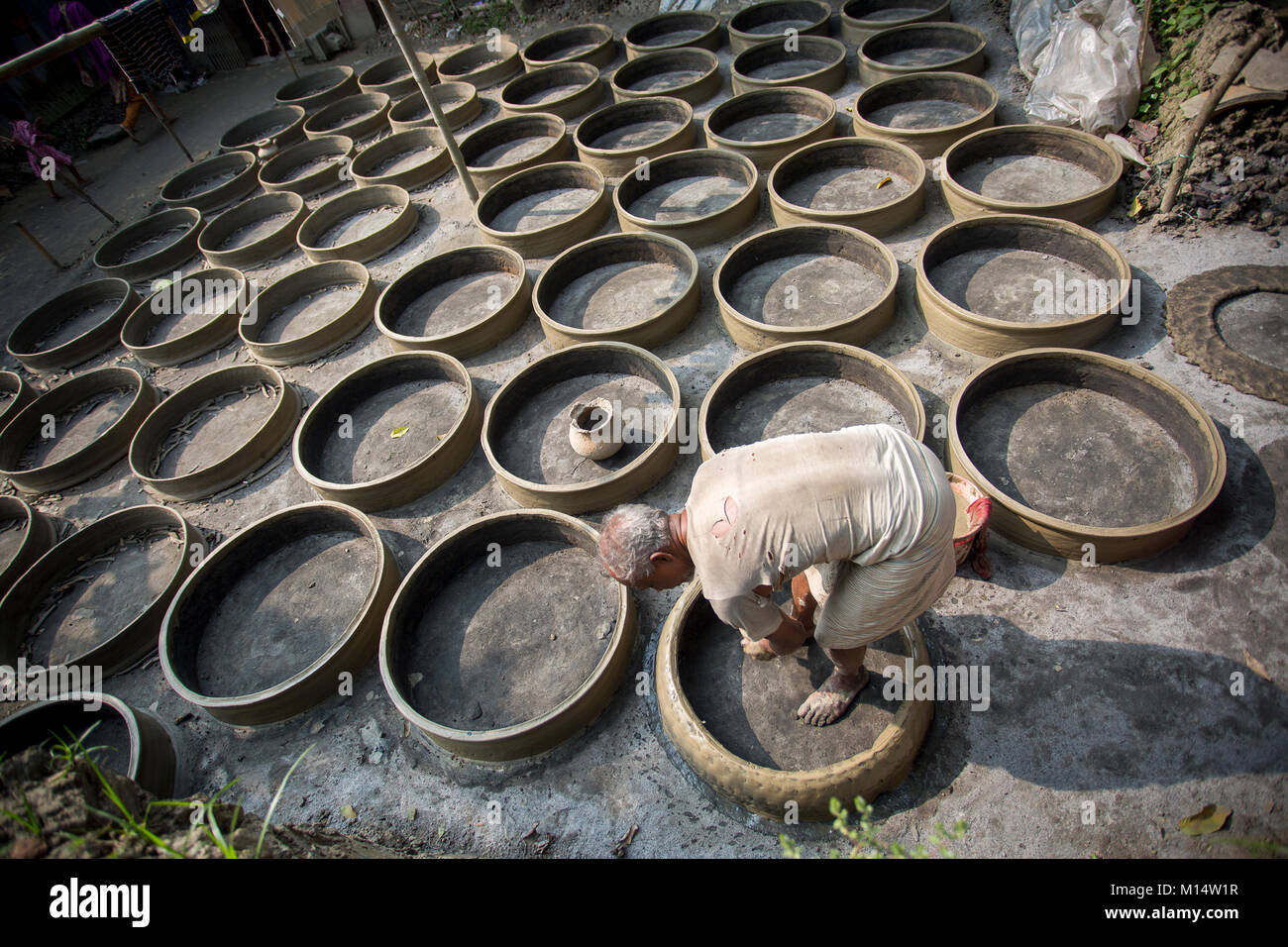 A potter Guru Poddo Pal working on this profession 40 years almost ...