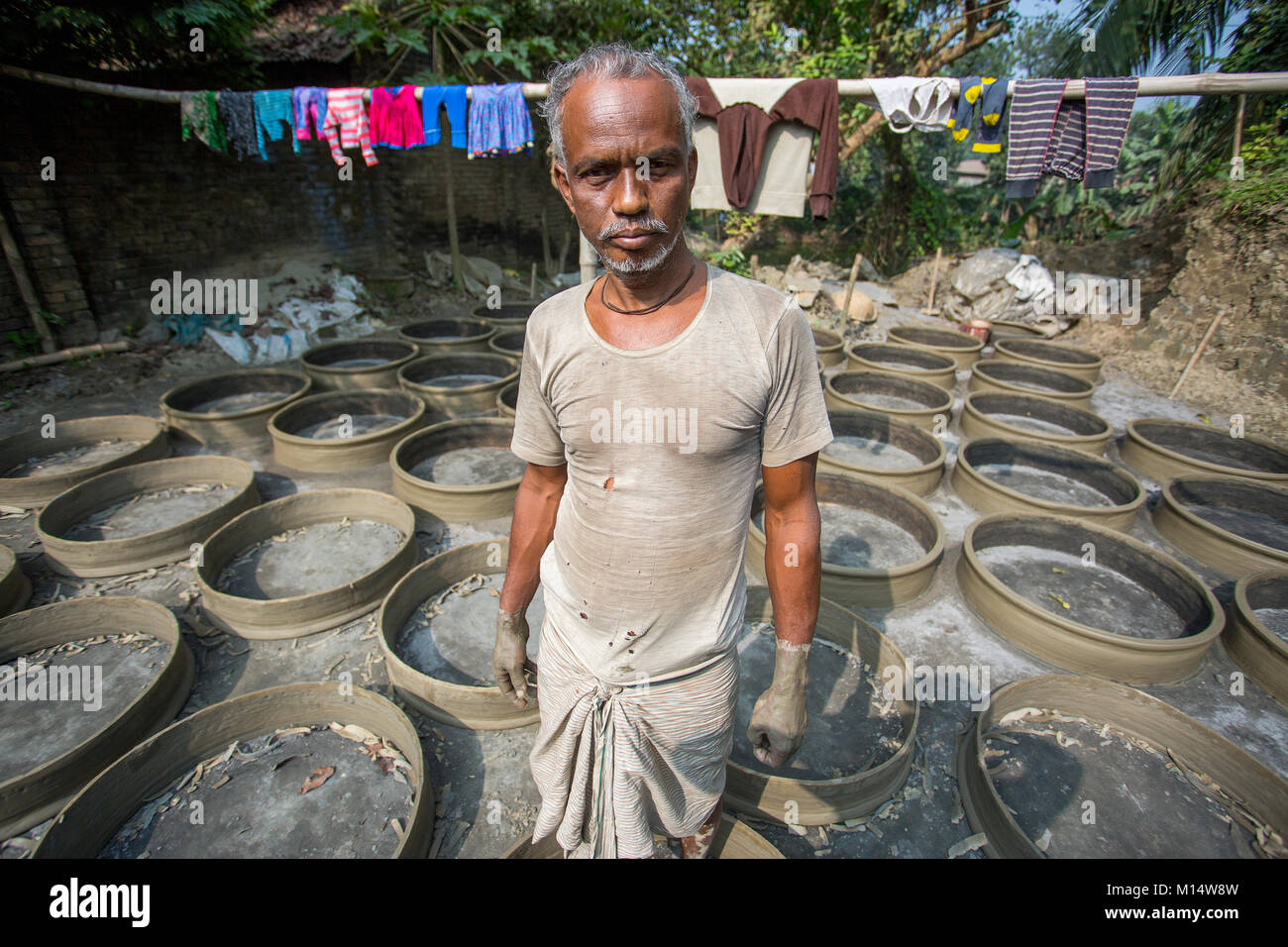 A potter Guru Poddo Pal working on this profession 40 years almost ...