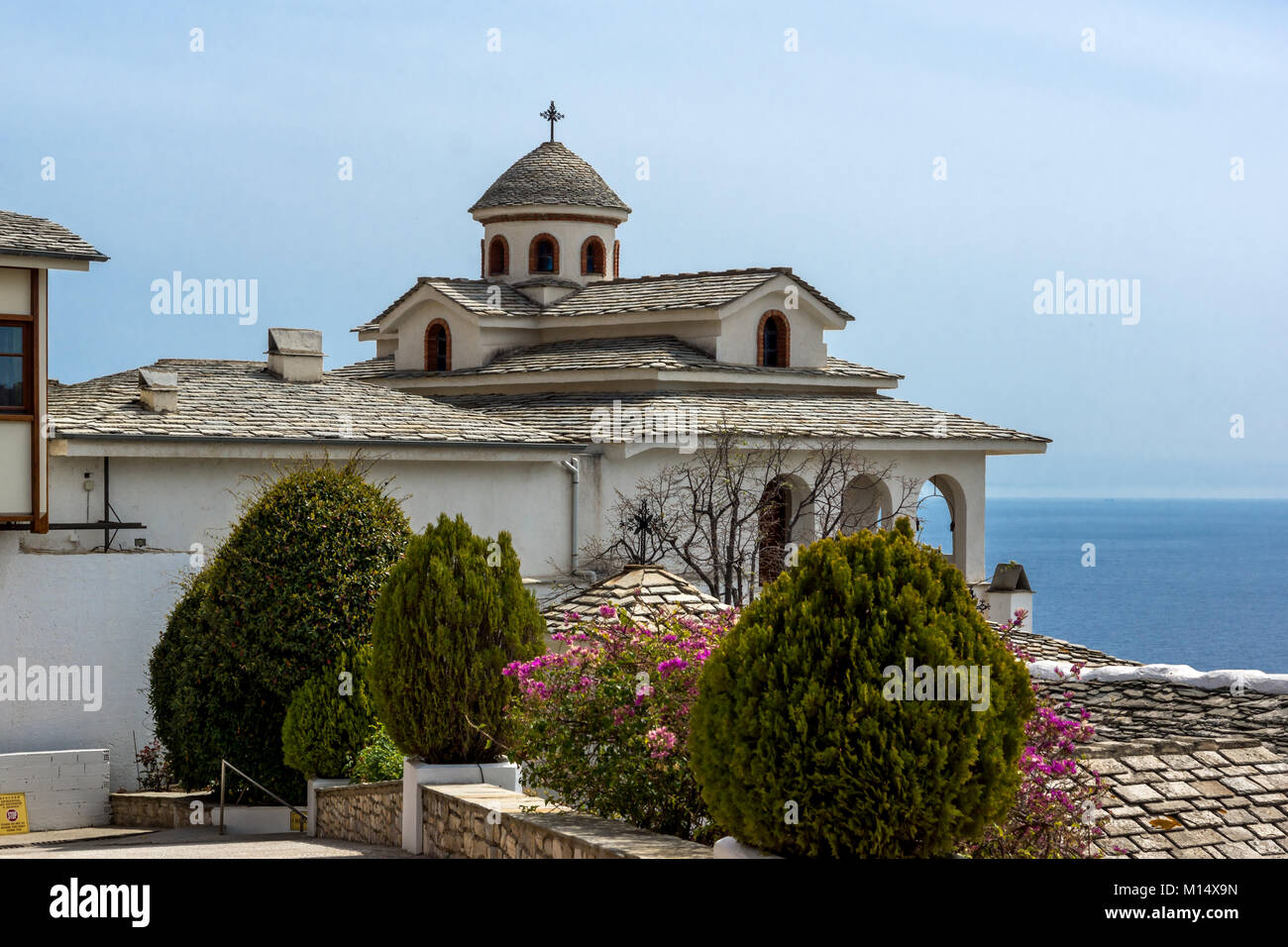 Church and spring flowers in Archangel Michael Monastery in Thassos ...