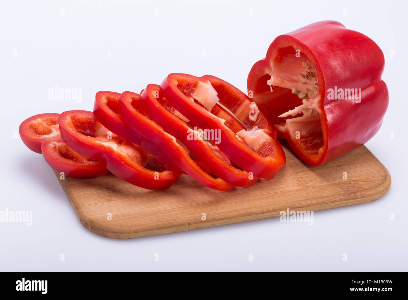 Sliced red pepper isolated on white background Stock Photo - Alamy