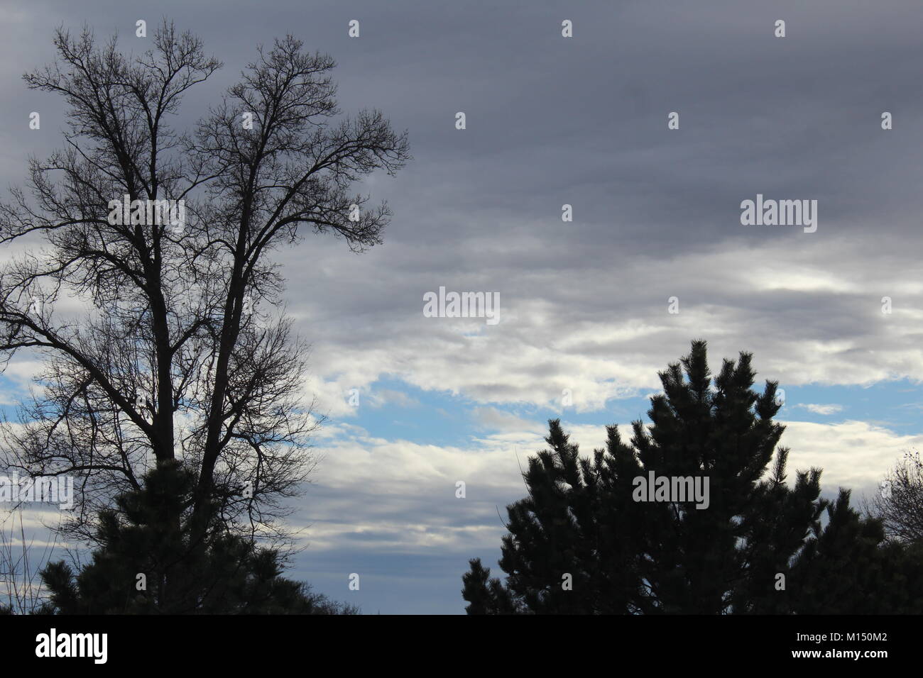Sun coming through clouds hi-res stock photography and images - Alamy
