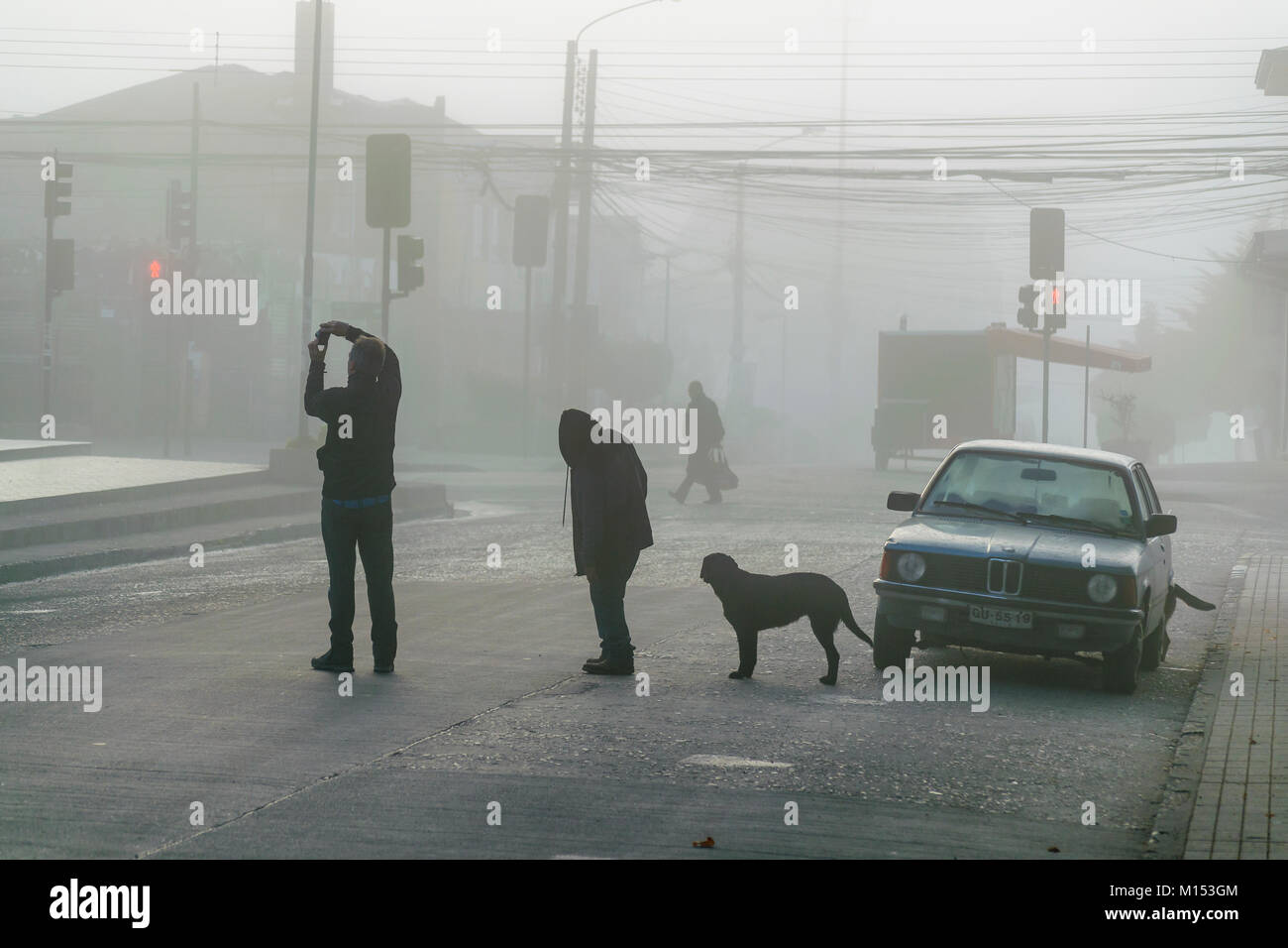 Foggy urban morning scene at chiloe island, chile Stock Photo - Alamy