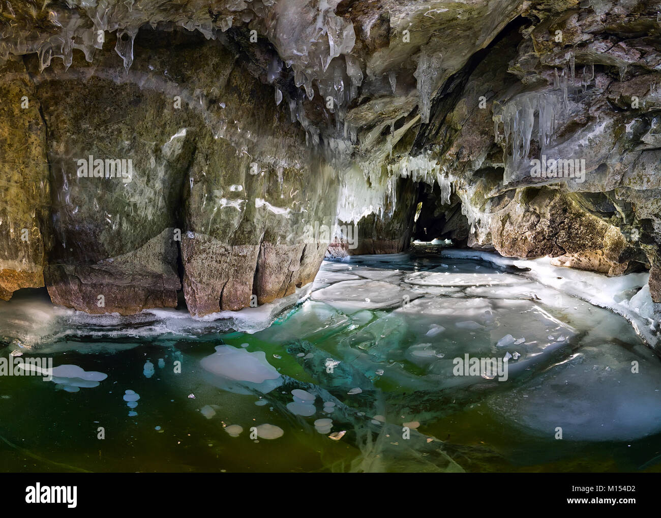 Panorama inside ice cave with icicles on Baikal, Olkhon Stock Photo - Alamy