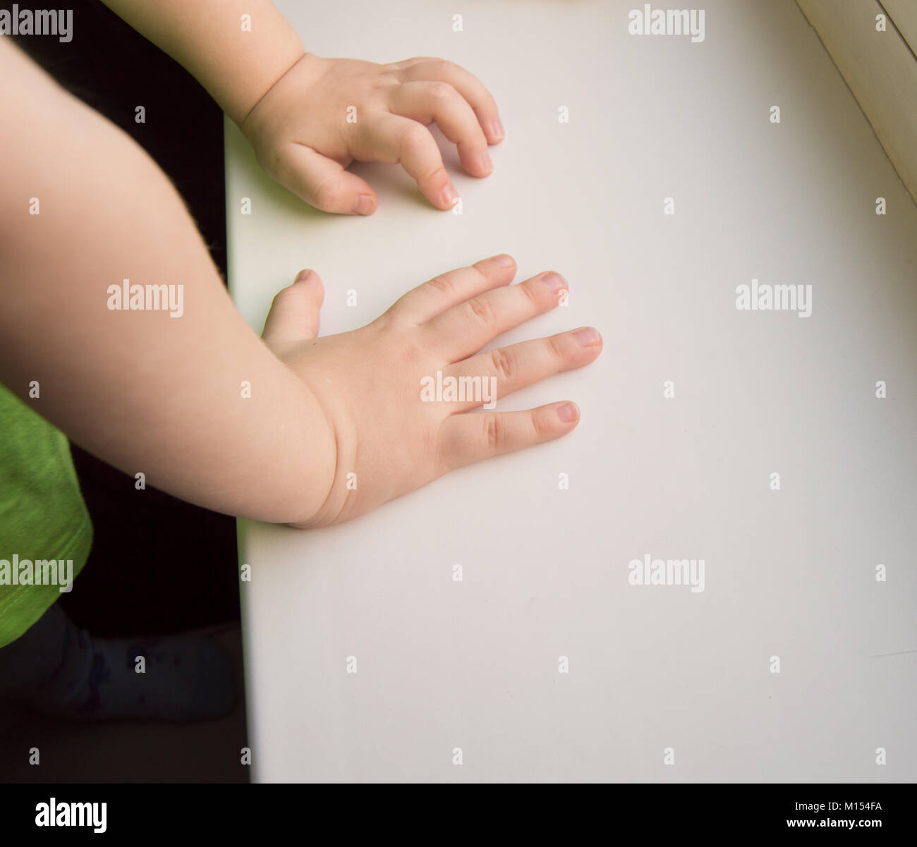 Child hand showing the five fingers isolated on a white background ...