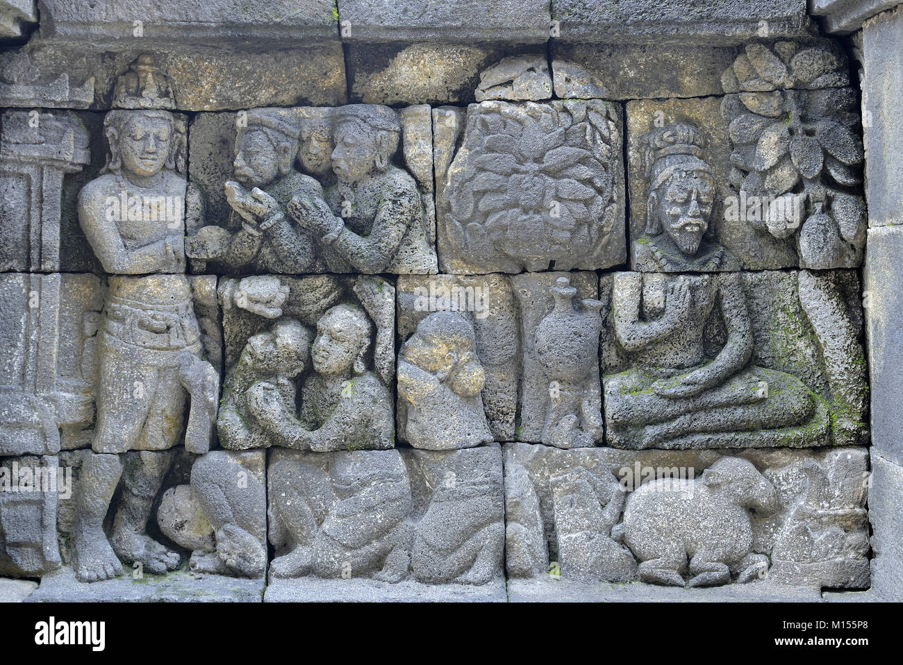 Detail of Buddhist carved relief in Borobudur temple in Yogyakarta ...