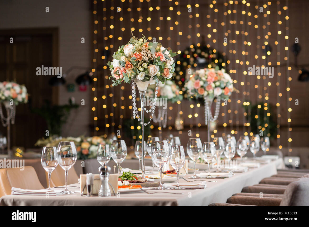 Decorated table in the restaurant, the preparation before the banquet ...