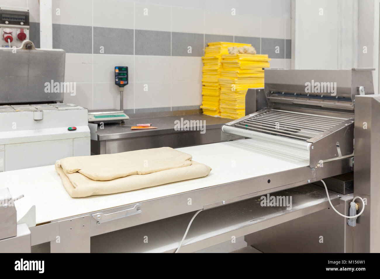 production line of frozen puff dough Stock Photo - Alamy