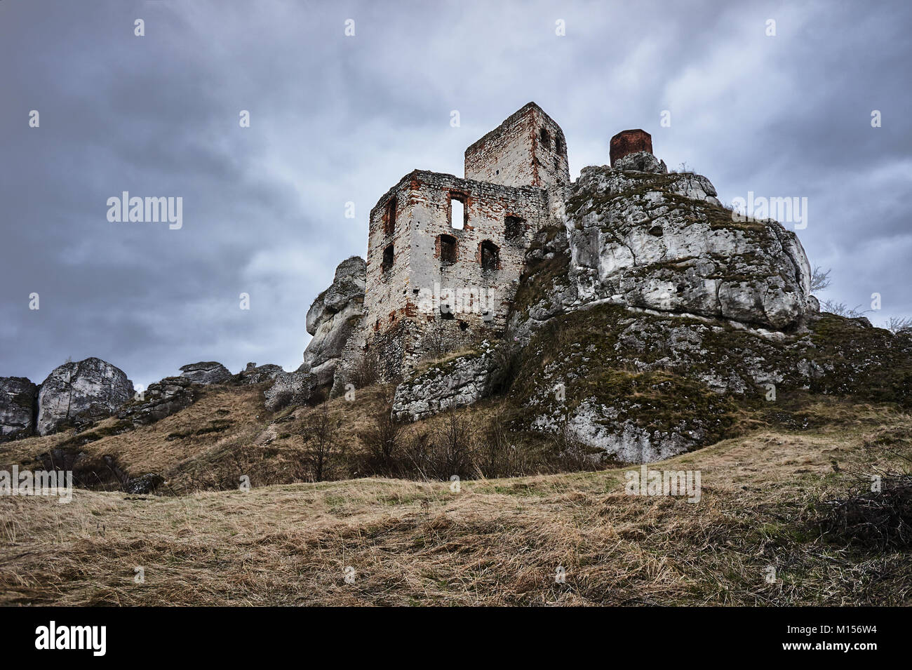 rocks and ruined medieval castle in Olsztyn, Poland Stock Photo - Alamy