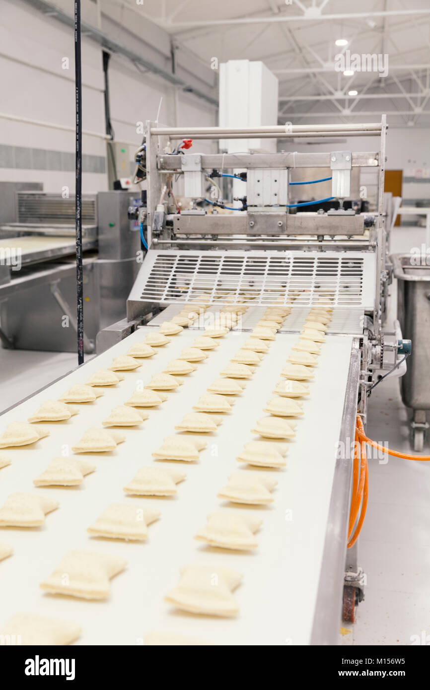 production line of frozen puff dough Stock Photo - Alamy