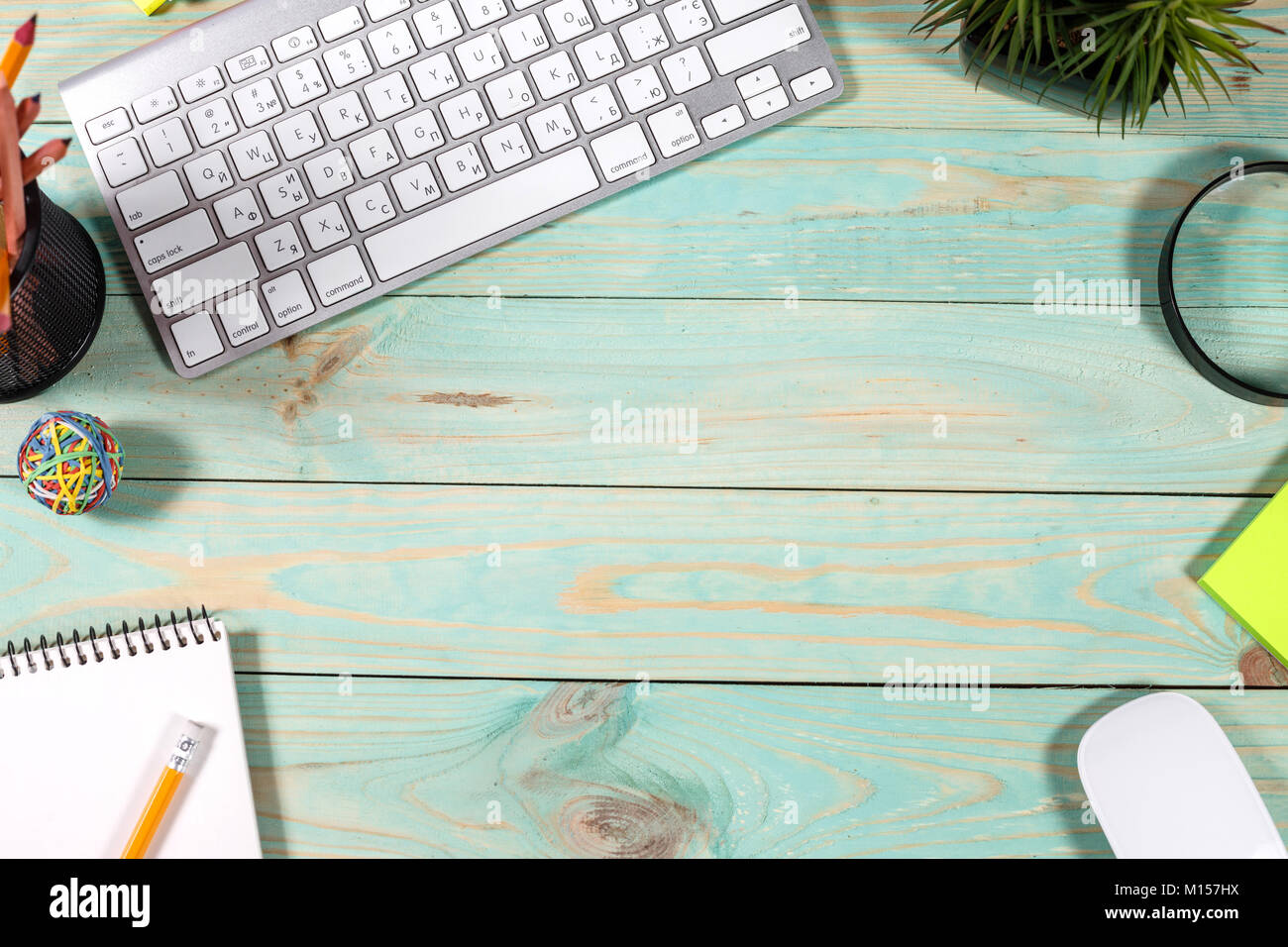 Modern green wooden office desk with laptop computer. Minimal concept ...