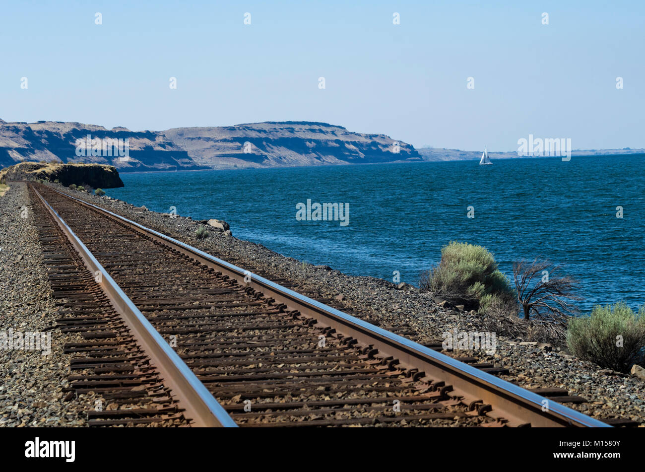Railroad tracks along the Columbia River showing two different ...