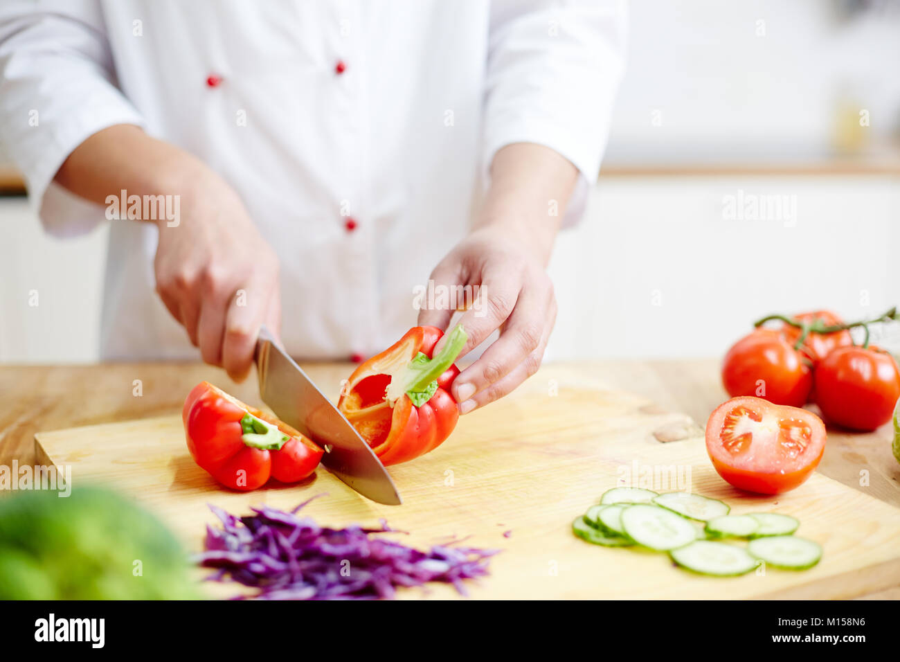 Professional chef cutting cucumber hi-res stock photography and images ...