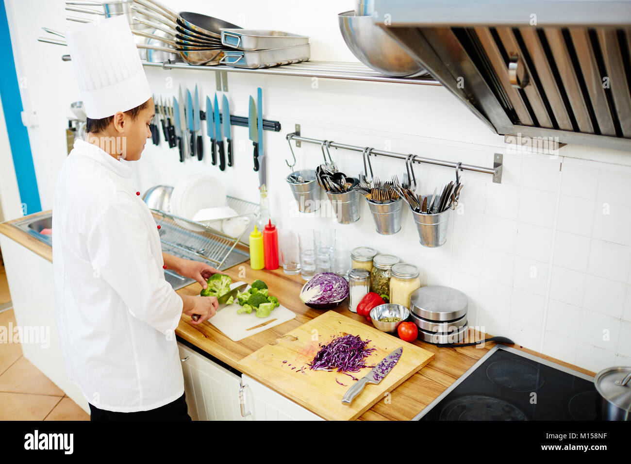 Cooking in restaurant Stock Photo - Alamy
