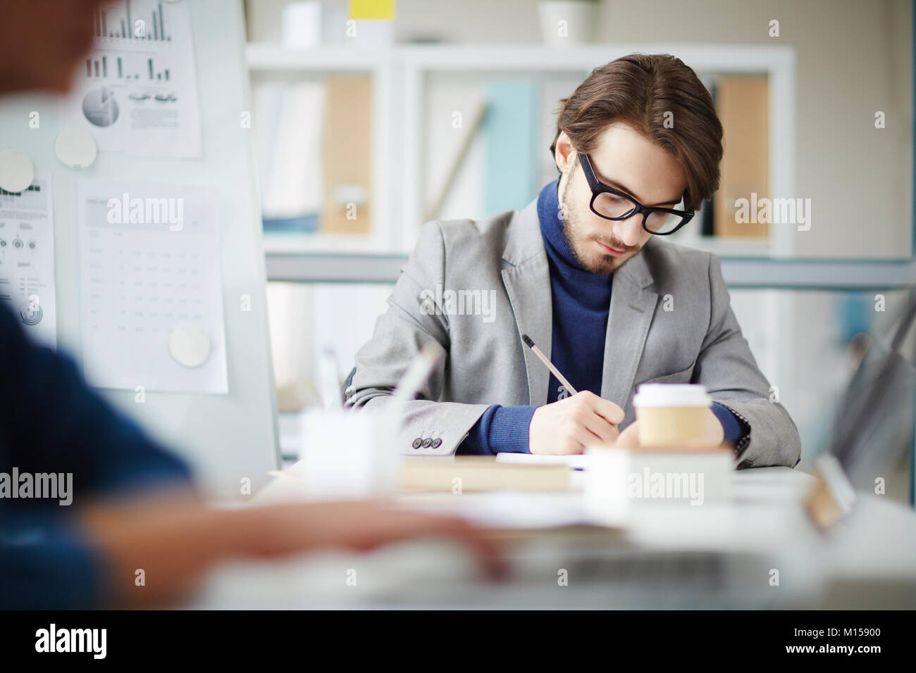 Businessman making notes planning hi-res stock photography and images ...