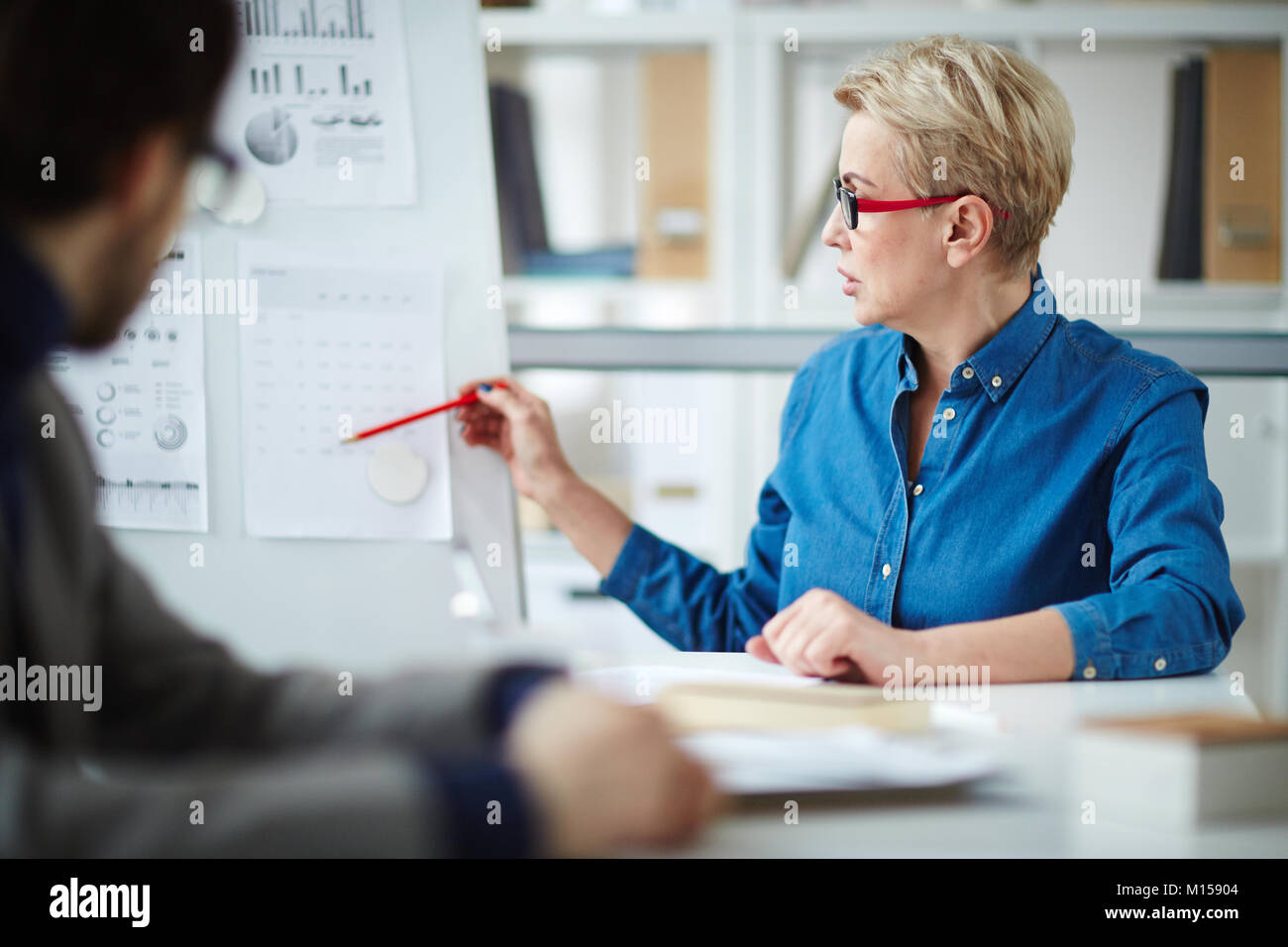 Pointing at paper Stock Photo - Alamy
