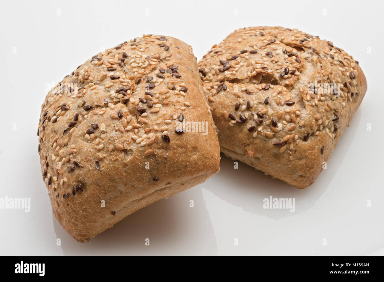italian special bread with various seeds on white background from above ...