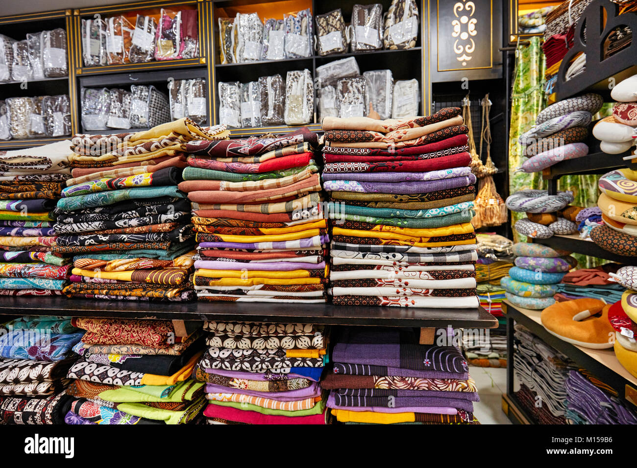 Folded shirts store asia hi-res stock photography and images - Alamy