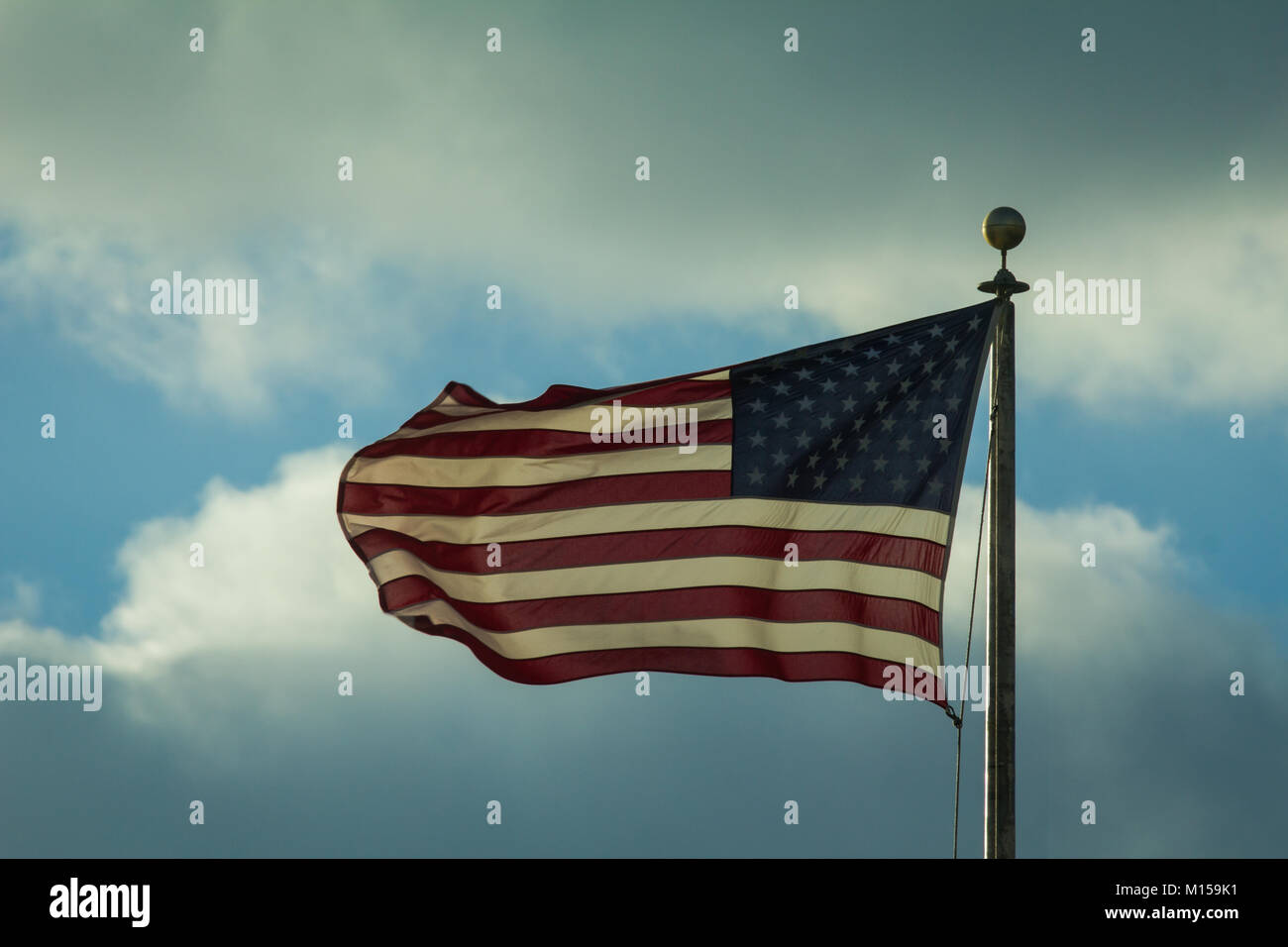 Ripped american flag waving hi-res stock photography and images - Alamy