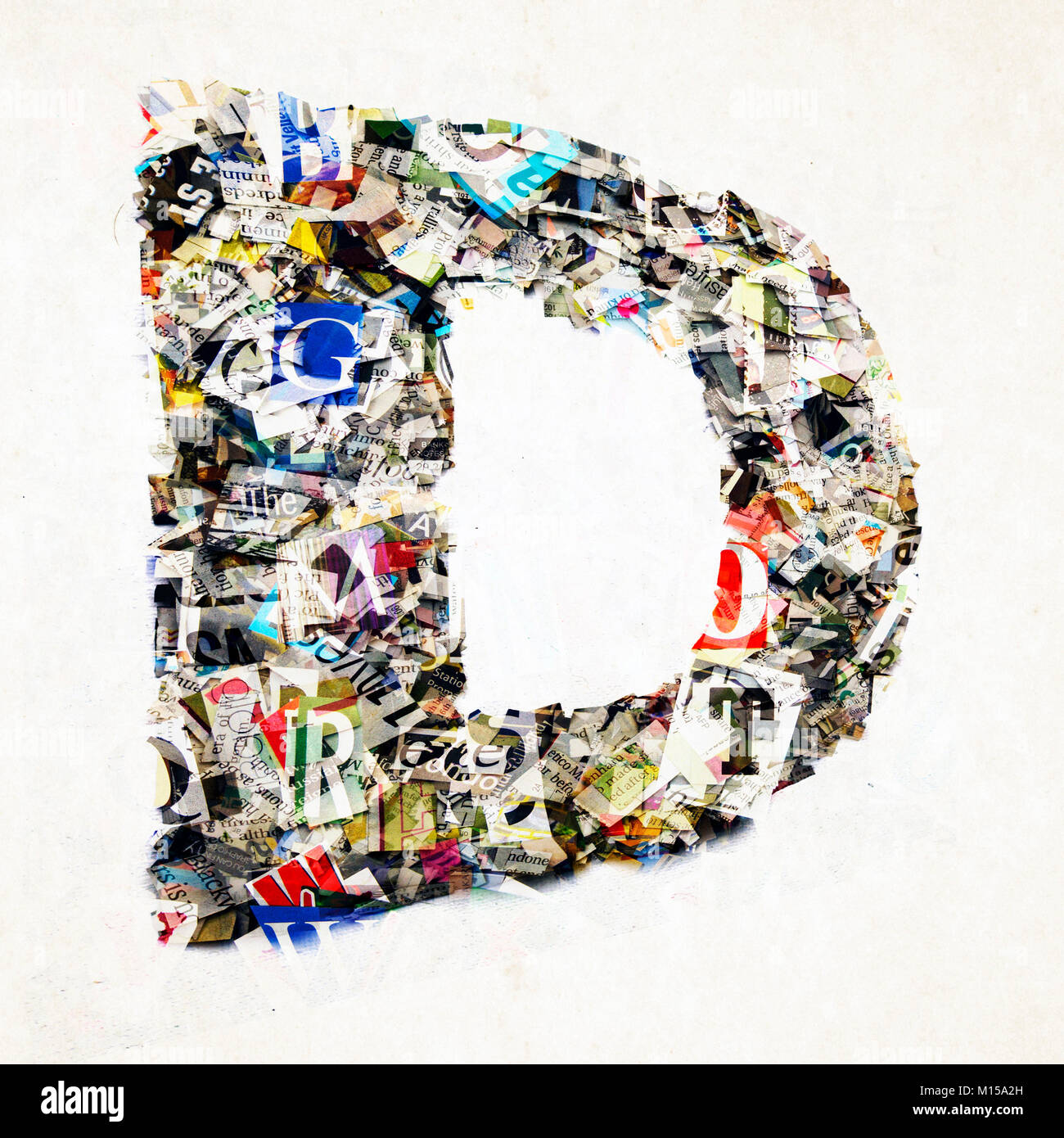 The letter D made from newspaper confetti Stock Photo - Alamy