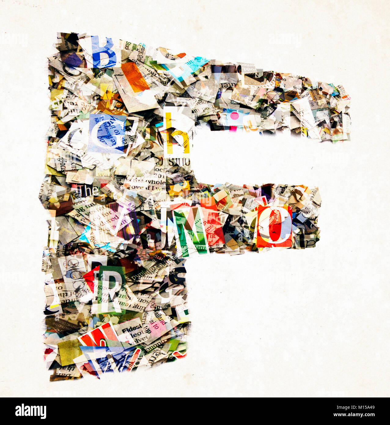 The letter F made from newspaper confetti Stock Photo - Alamy