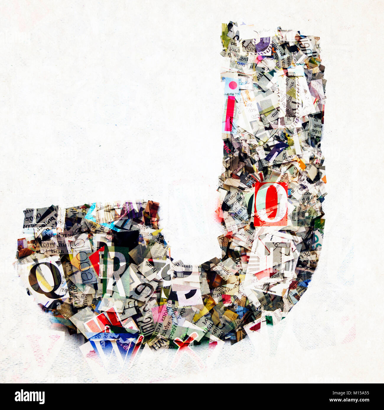 The letter J made from newspaper confetti Stock Photo - Alamy