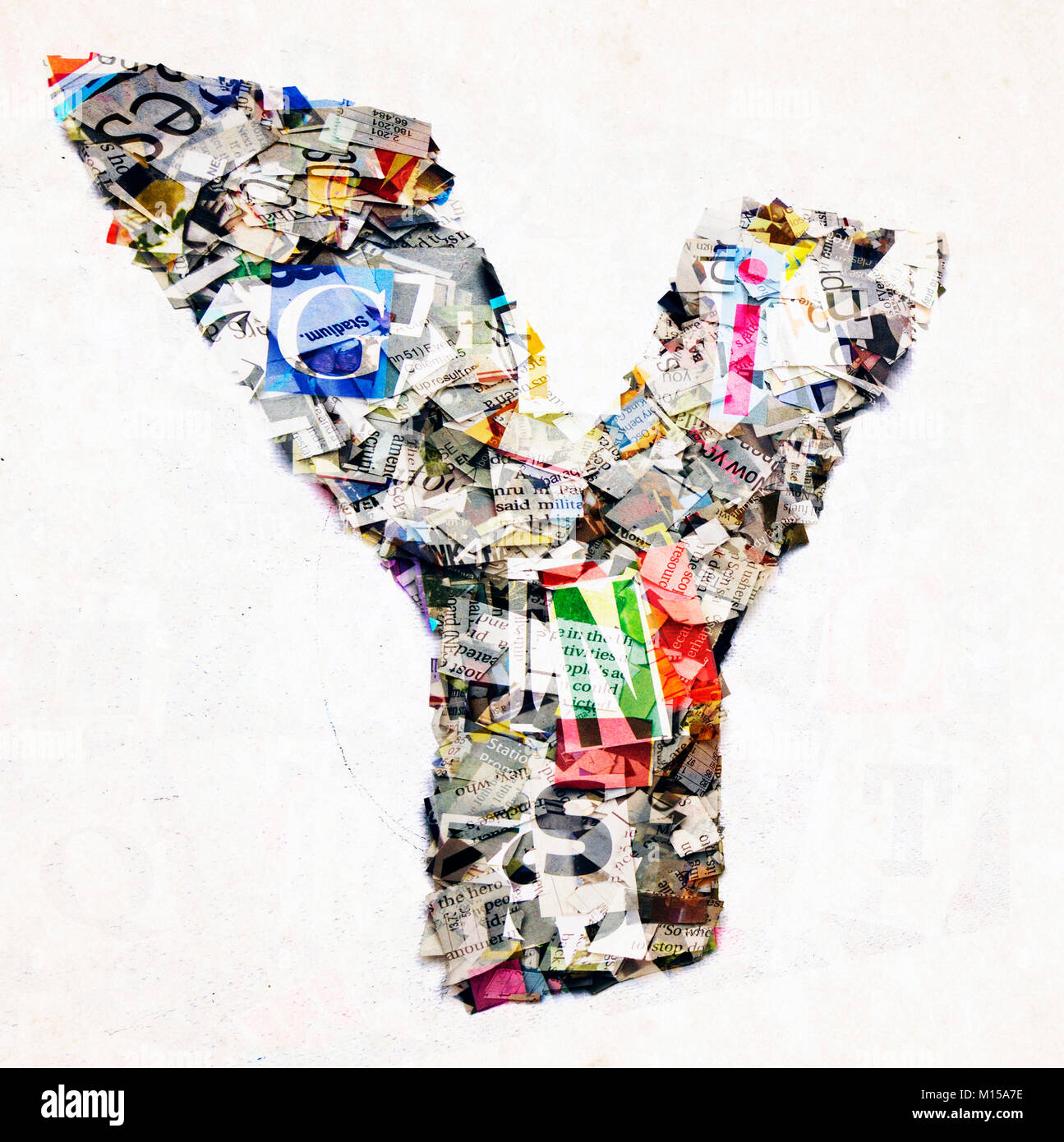 The letter Y made from newspaper confetti Stock Photo - Alamy