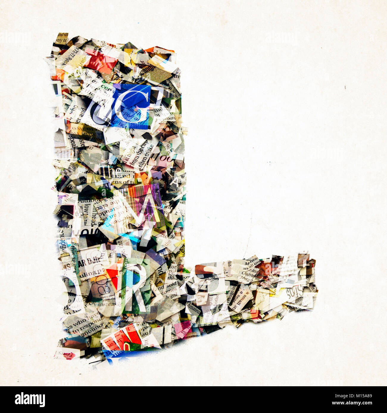 The letter L made from newspaper confetti Stock Photo - Alamy