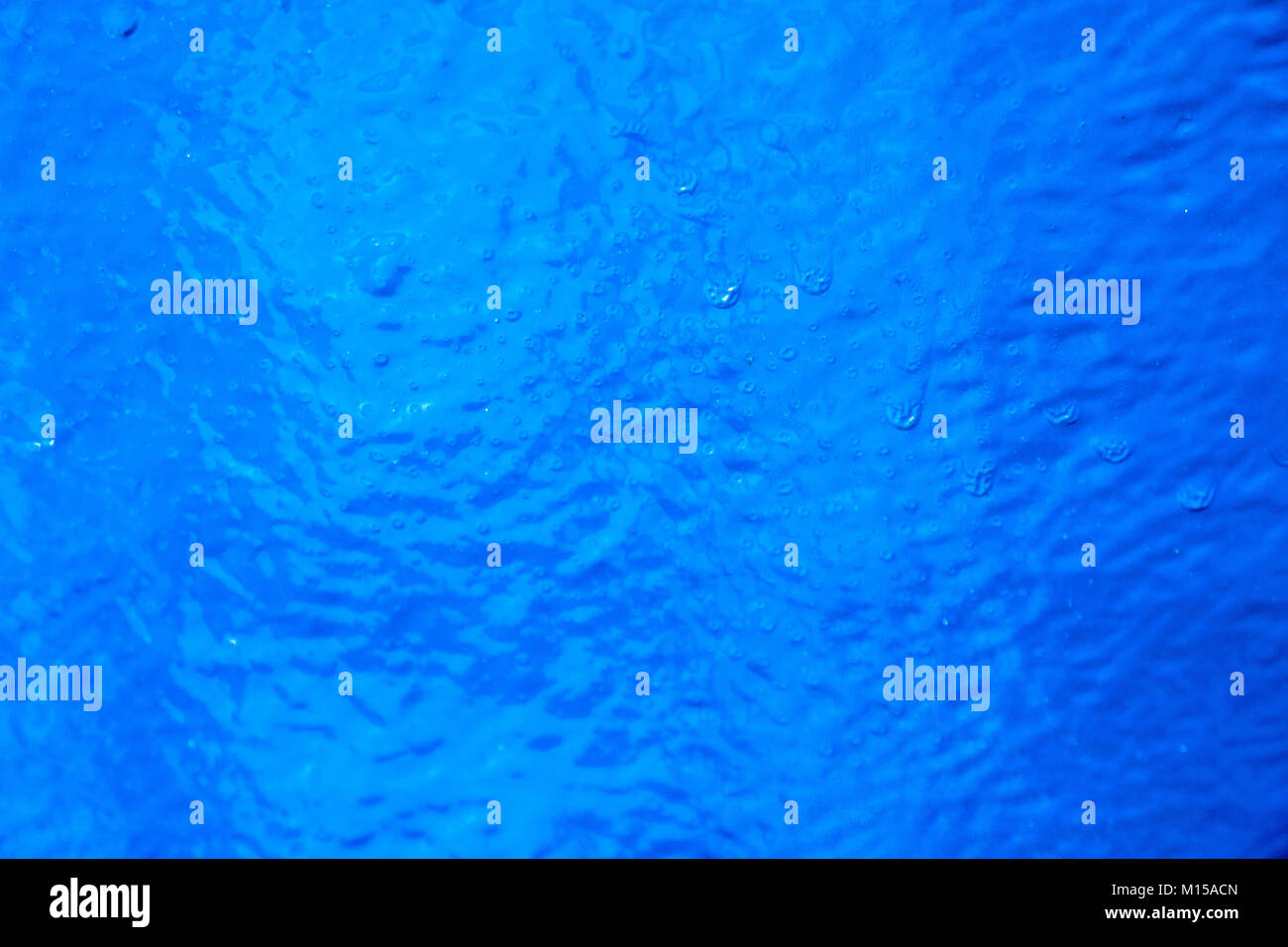 Blue background - solid paint Stock Photo - Alamy