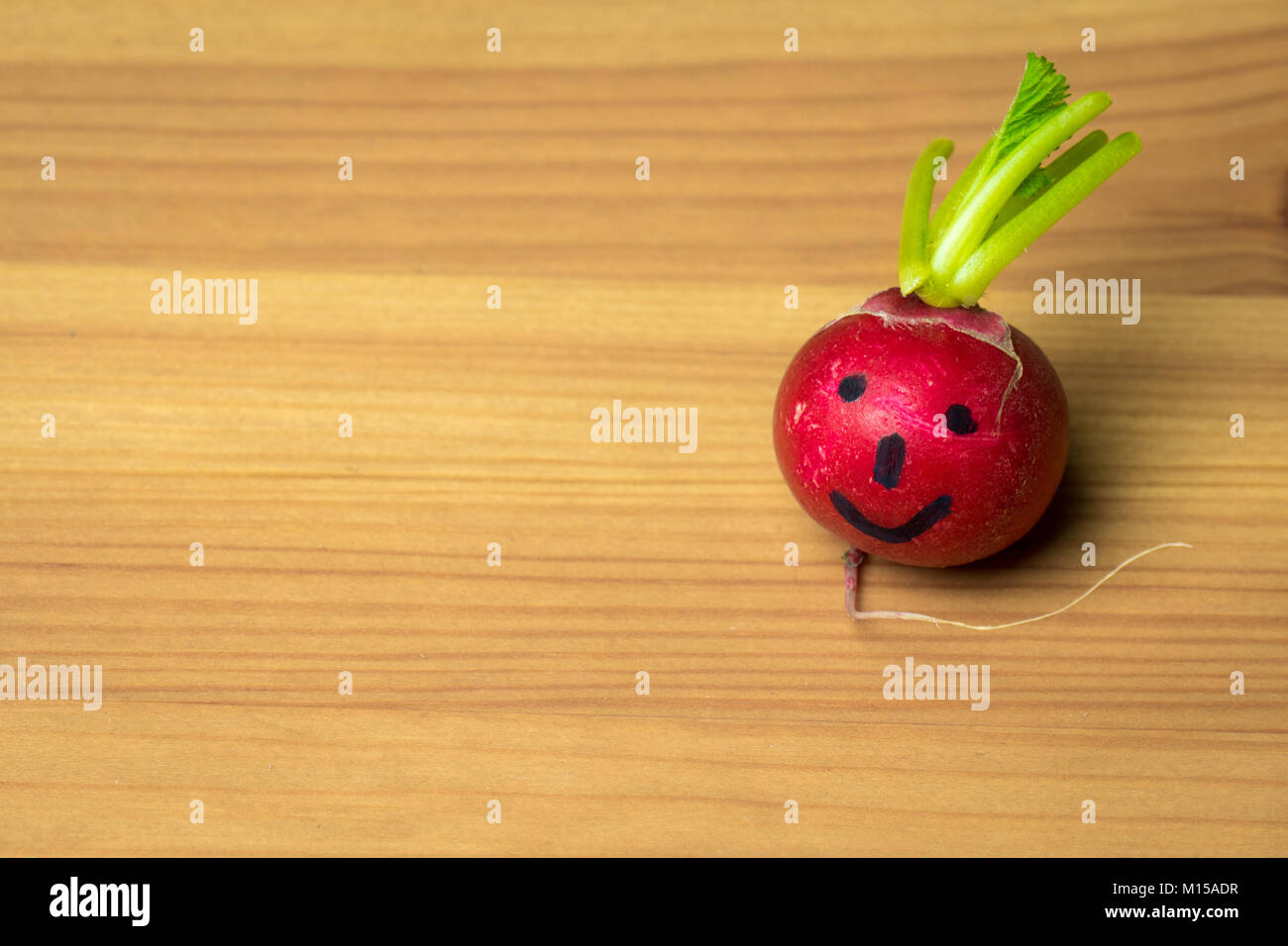Red radish with funny happy face Stock Photo - Alamy