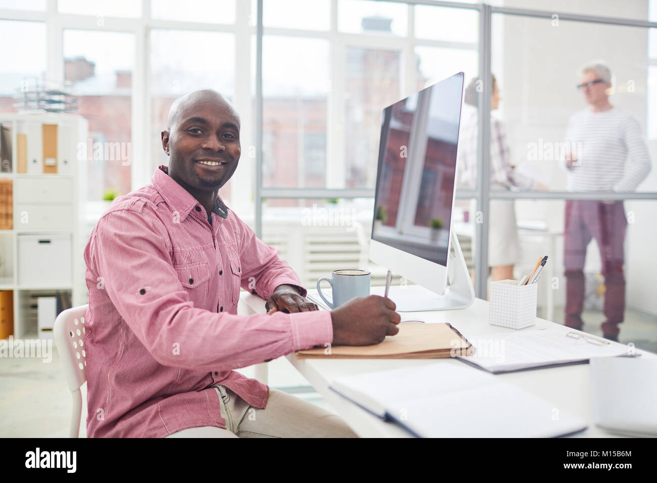 Man organizing work Stock Photo - Alamy