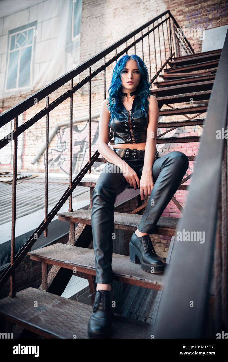 Pretty Blue Haired Rock Girl Informal Model Dressed In The Black