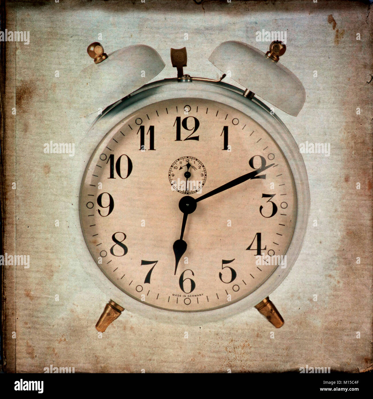 Old fashioned alarm clock Stock Photo - Alamy