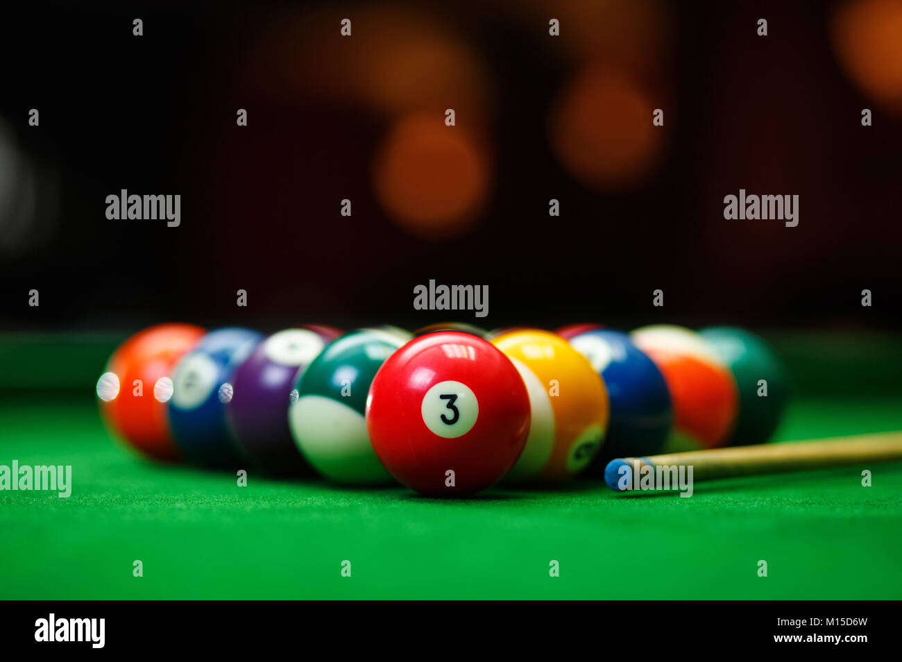 Billiard balls in a green pool table, game Stock Photo - Alamy
