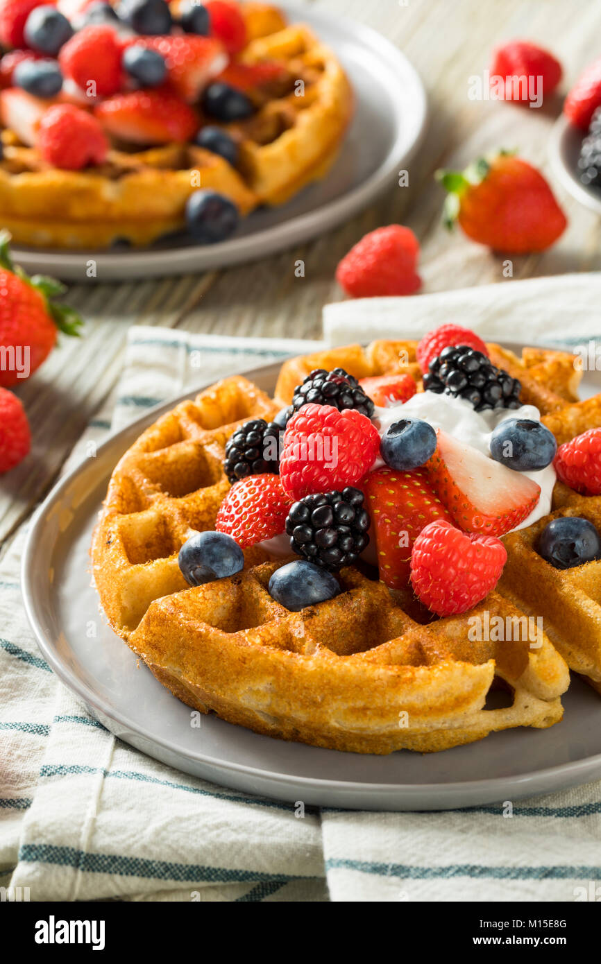 Sweet Homemade Berry Belgian Waffle with Whipped Cream Stock Photo - Alamy