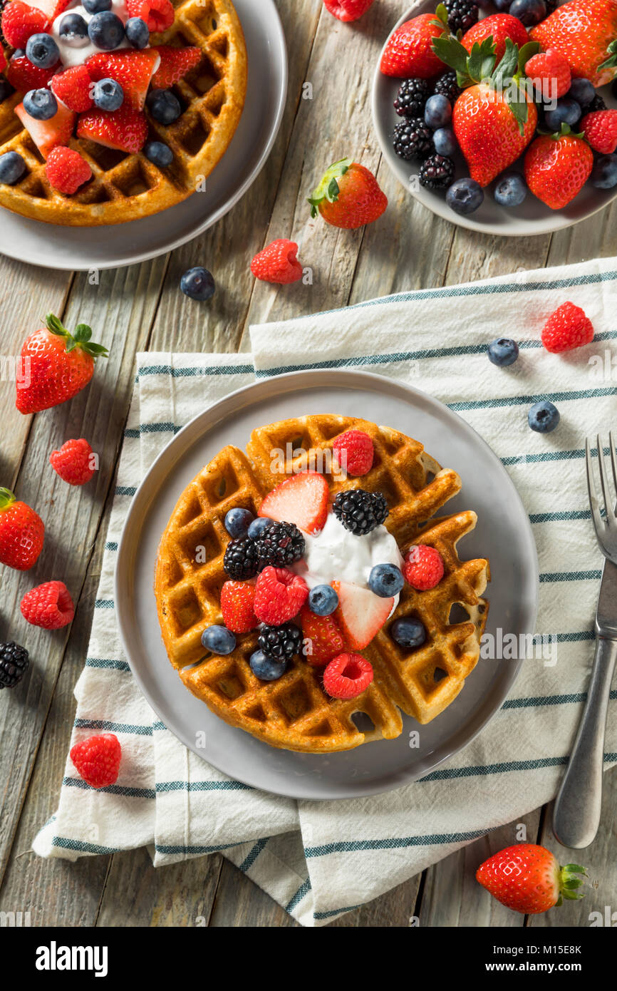 Sweet Homemade Berry Belgian Waffle with Whipped Cream Stock Photo - Alamy