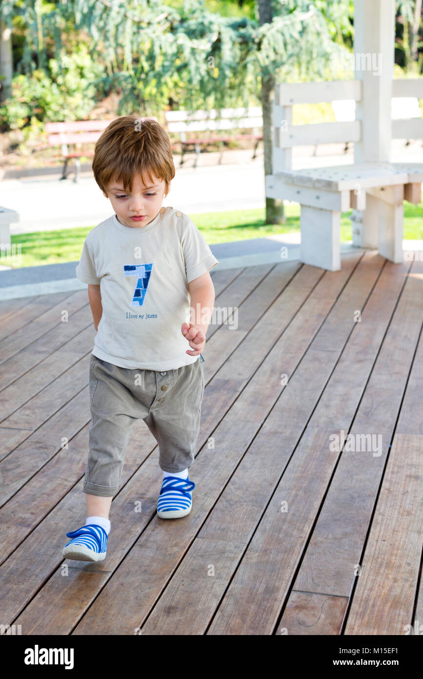 Child walking with parent hi-res stock photography and images - Alamy