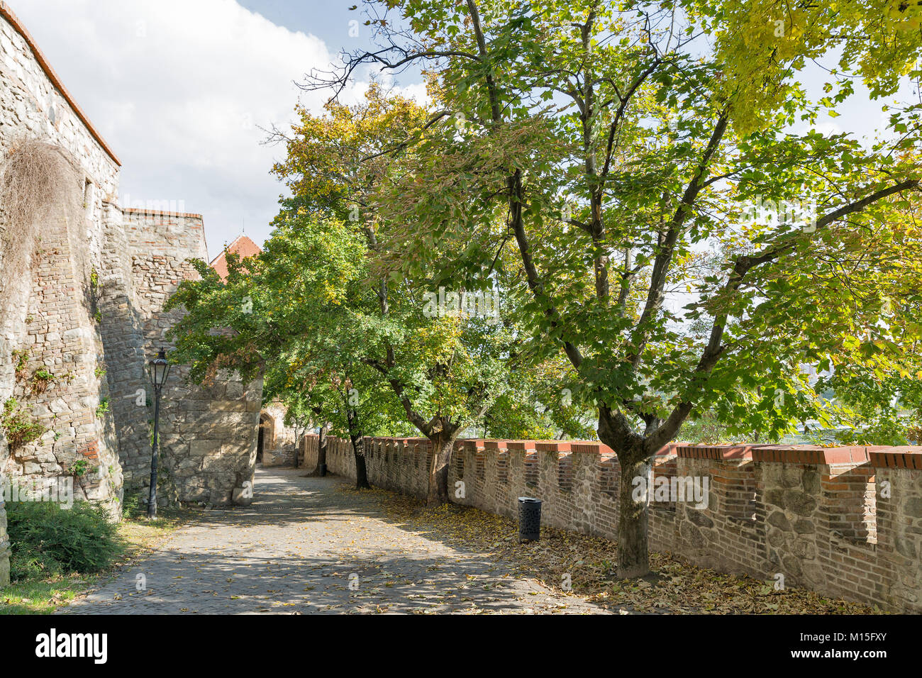 Medieval castle alley, gate and walls in Bratislava, Slovakia Stock ...