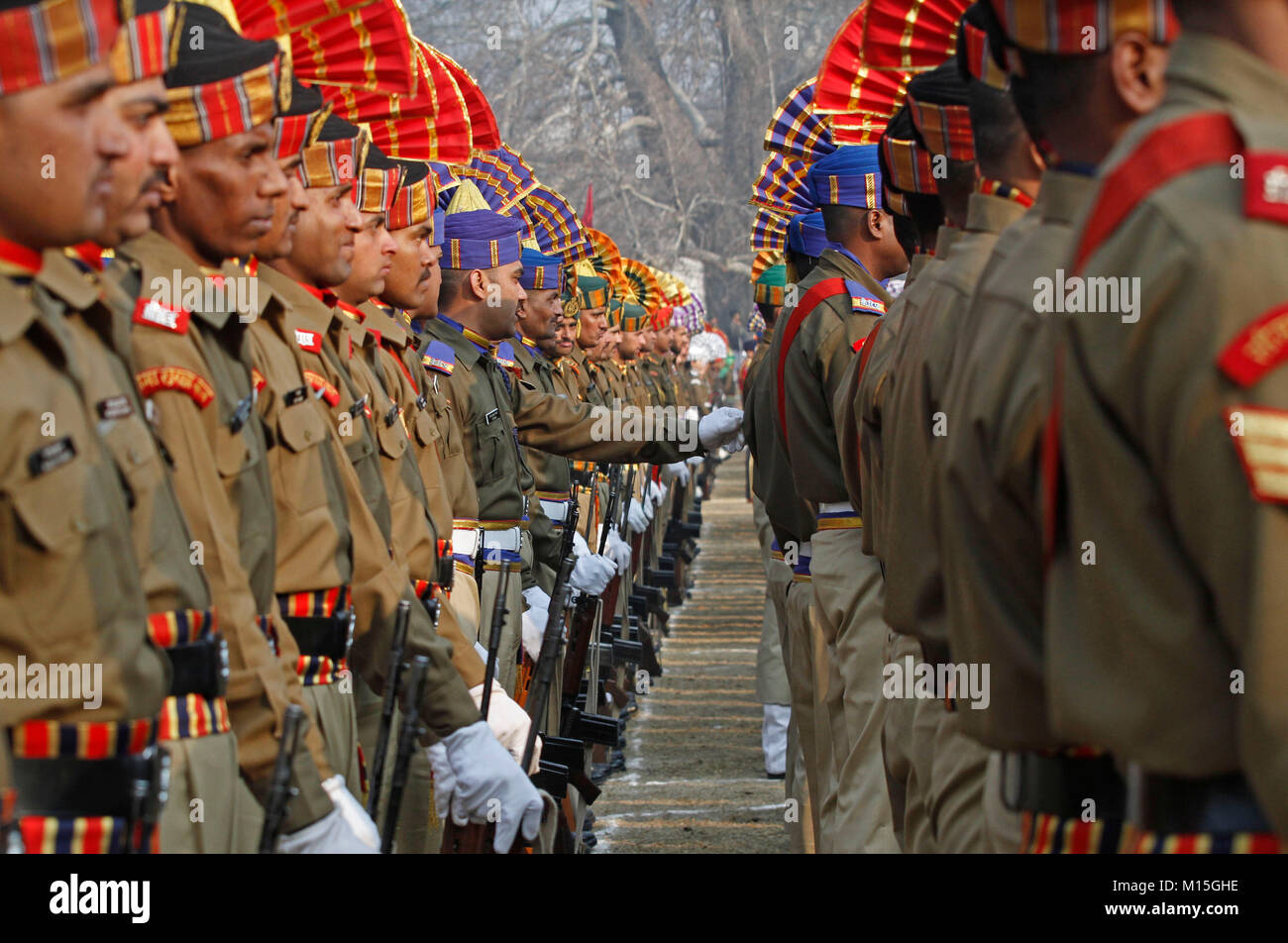 India. 25th Jan, 2018. A indian policeman shaping the uniform of his ...