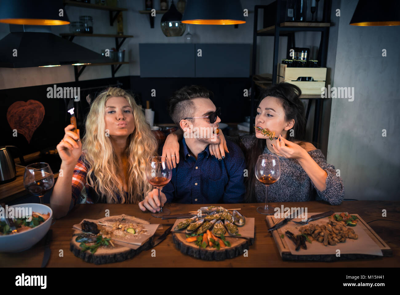 Two women sitting at kitchen table hi-res stock photography and images ...