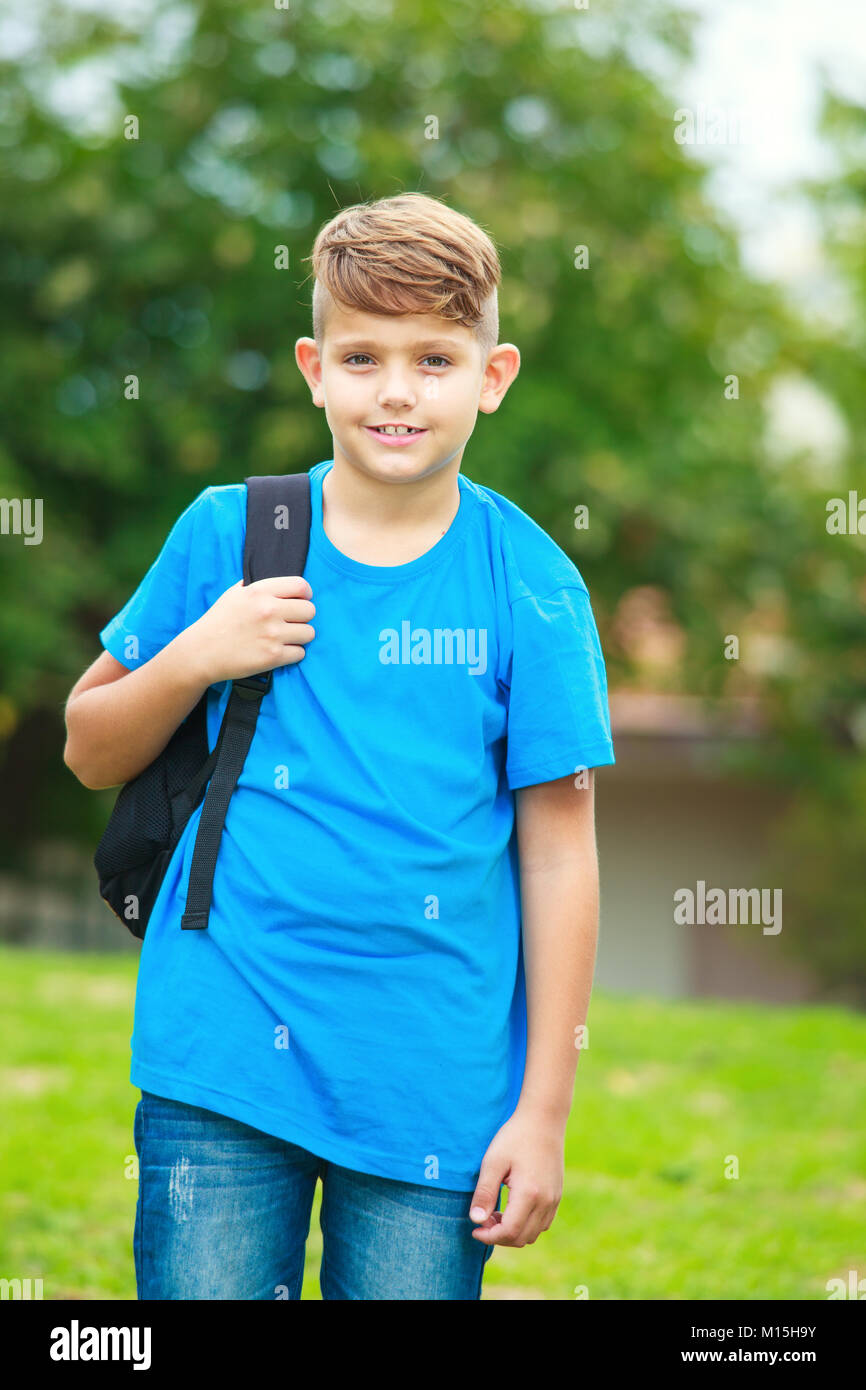 School Boy with backpack at the park Stock Photo - Alamy