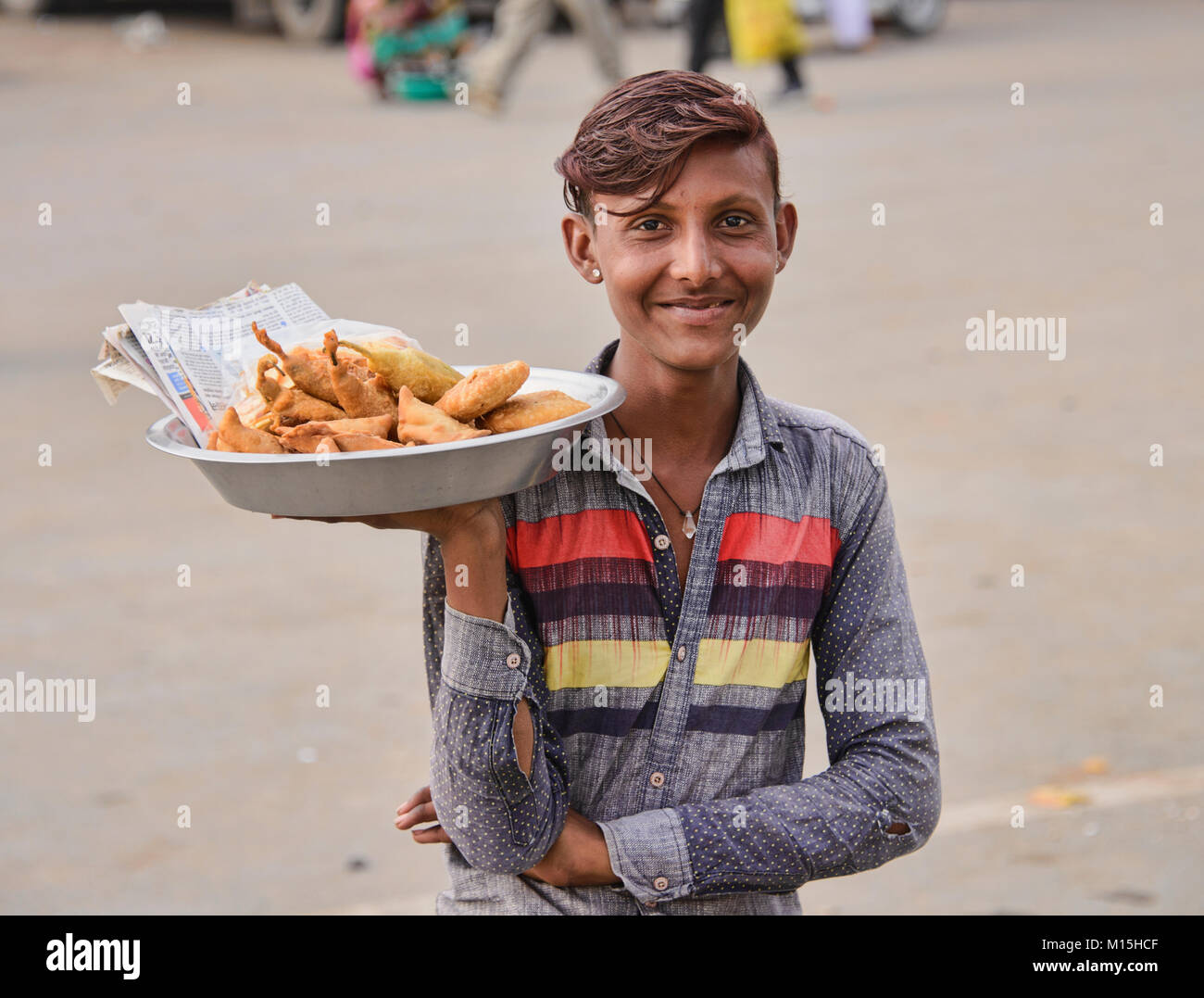 A street vendor selling Chilli bomb, Mirchi Vada in Udaipur, Rajasthan ...