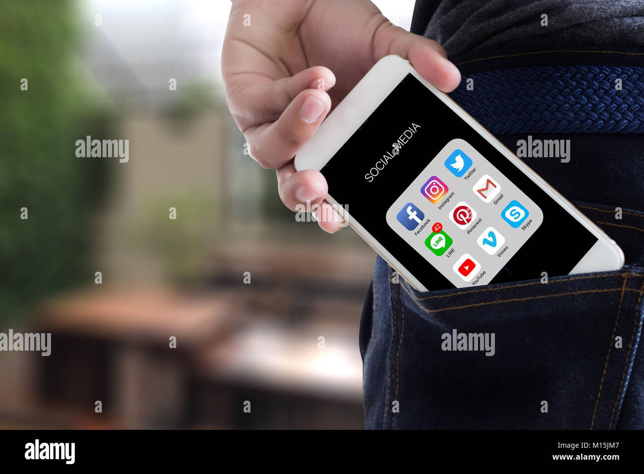 BANGKOK , THAILAND - January 27th, 2017: Hand of man using Iphone with ...