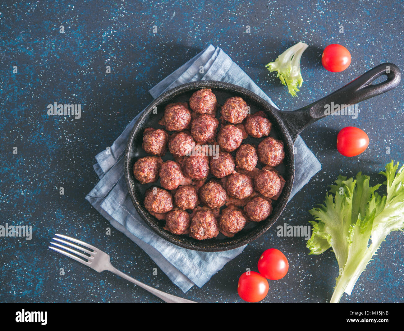Homemade beef meatballs in cast-iron skillet Stock Photo - Alamy