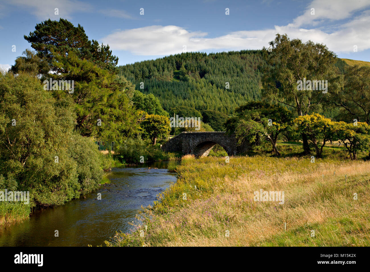 Stream flowing under stone bridge hi-res stock photography and images ...