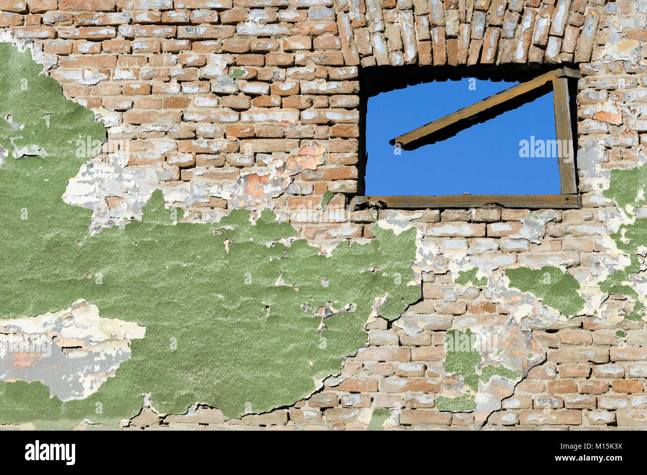 Abandoned house with a brick wall without windows Stock Photo - Alamy