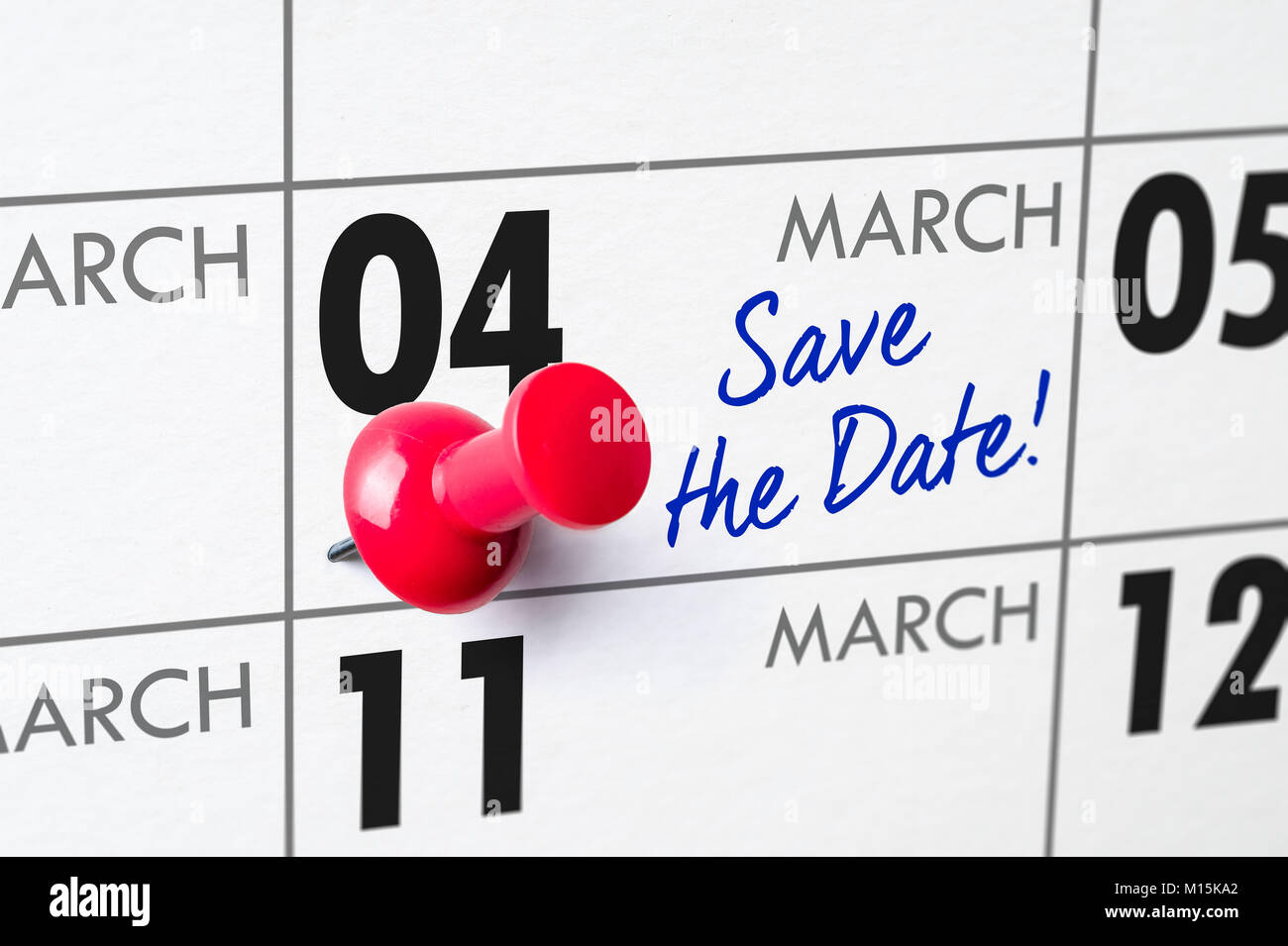 Wall calendar with a red pin - March 04 Stock Photo - Alamy